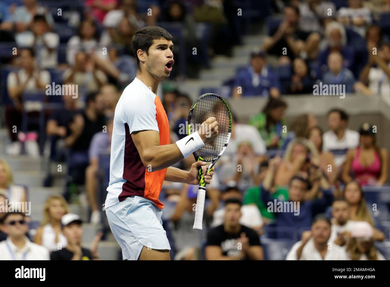 Carlos Alcaraz, of Spain, celebrates after winning a point against ...