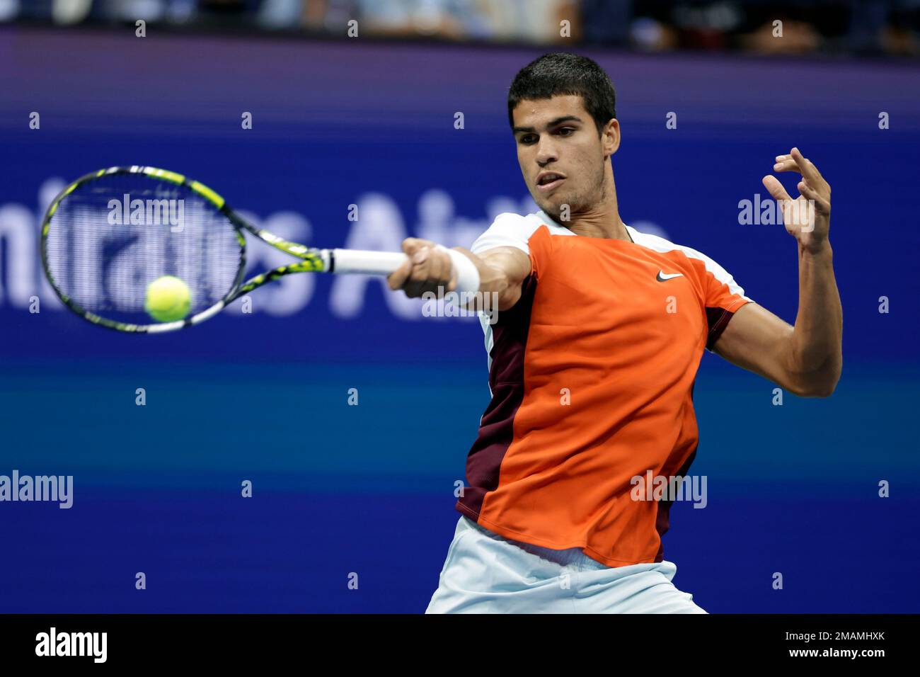 Carlos Alcarez, of Spain, returns a shot against Marin Cilic, of ...