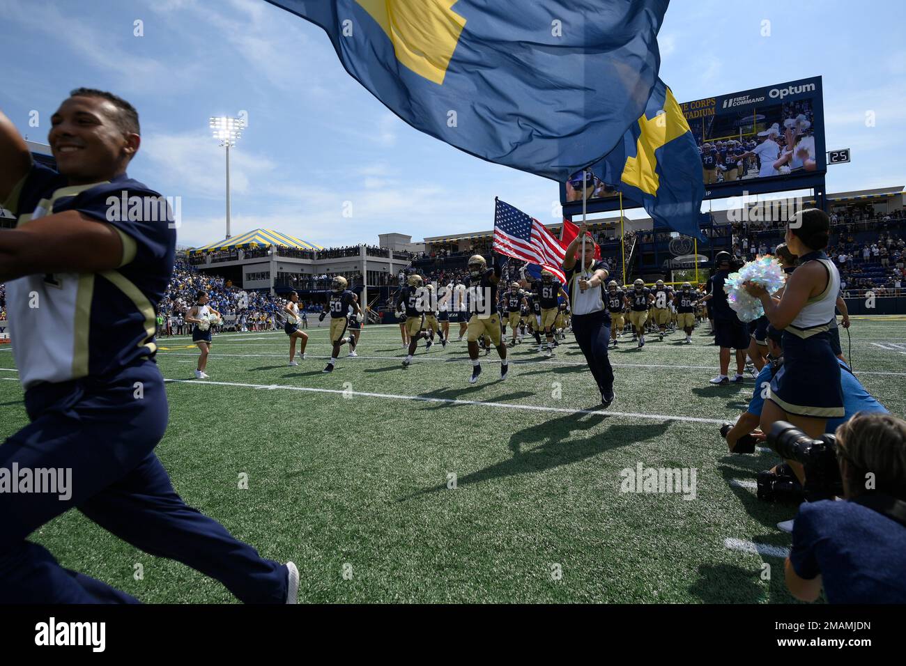 Navy takes the field before an NCAA college football game against ...