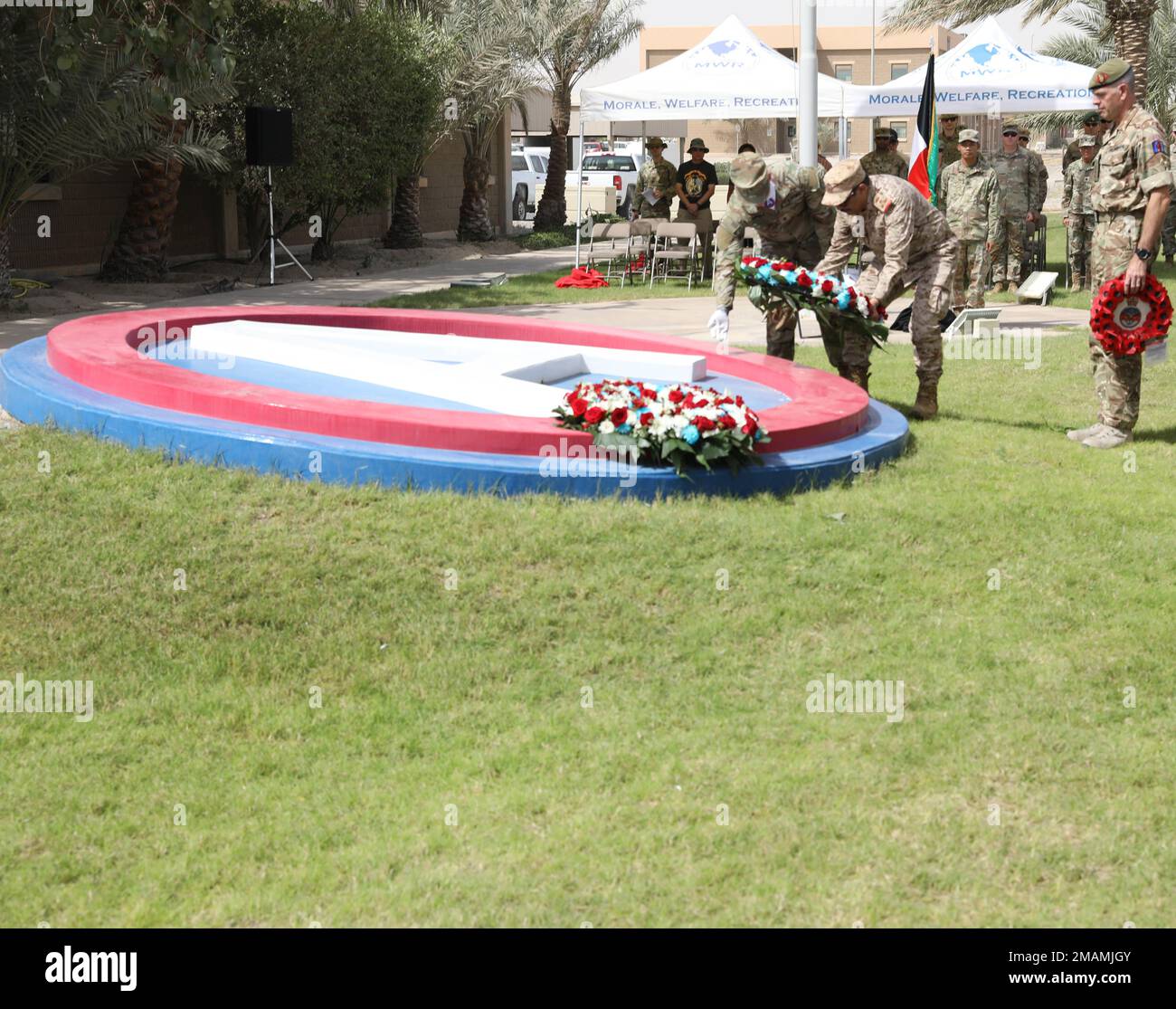 Kuwait Army Brig. Gen. Mohammed Turk Al-Mutairi lays a wreath during a ...