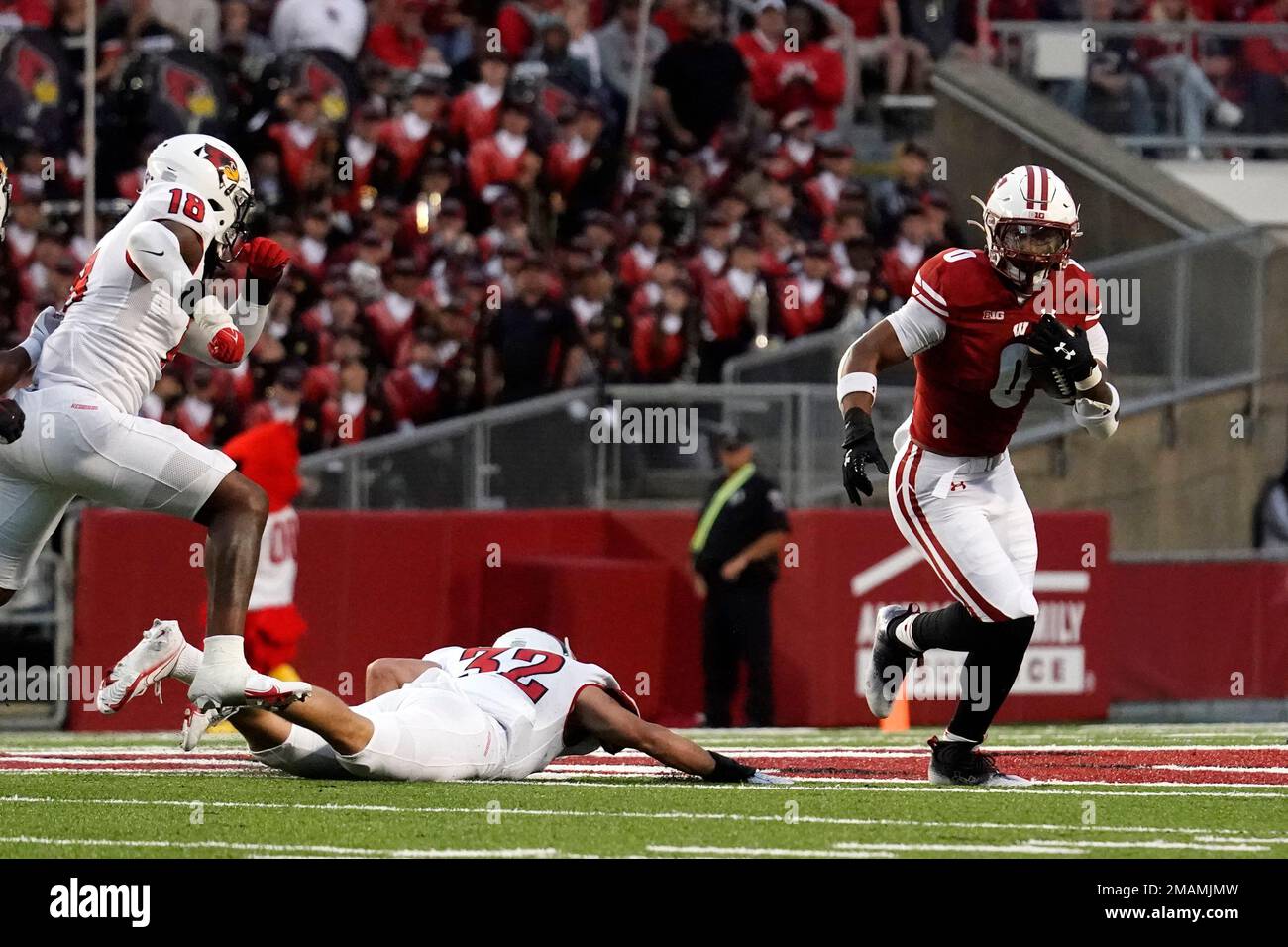 Wisconsin's Braelon Allen (0) runs past Illinois State's Cade Campos ...