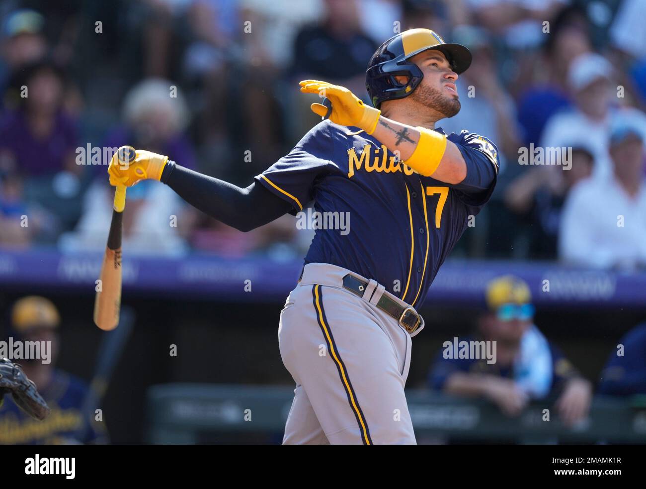 Milwaukee Brewers' Victor Caratini follows the flight of his three-run ...