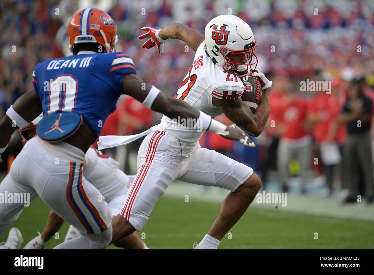 Utah wide receiver Solomon Enis (21) runs after catching a pass in ...