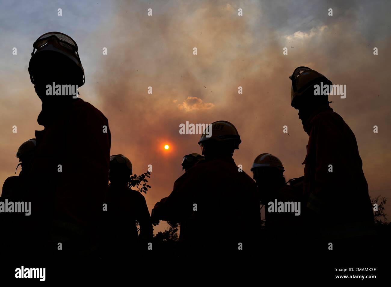 Firefighters arrive to extinguish a large-scale fire in the native ...