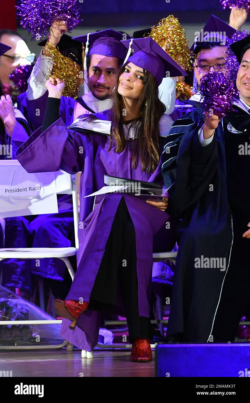 Model and author Emily Ratajkowski (c) seen sitting after delivering ...
