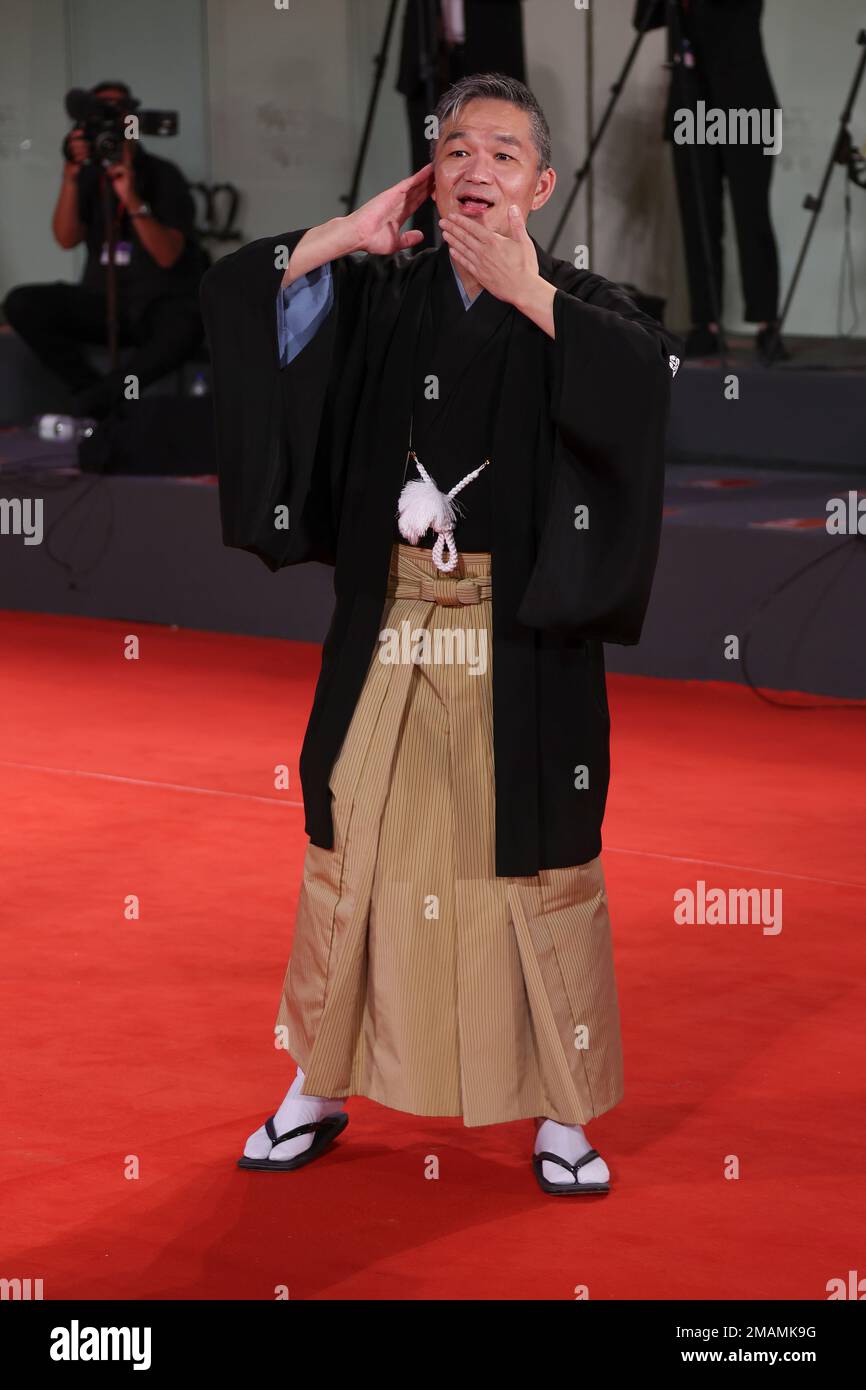 Atom Sunada poses for photographers upon arrival at the premiere of the ...