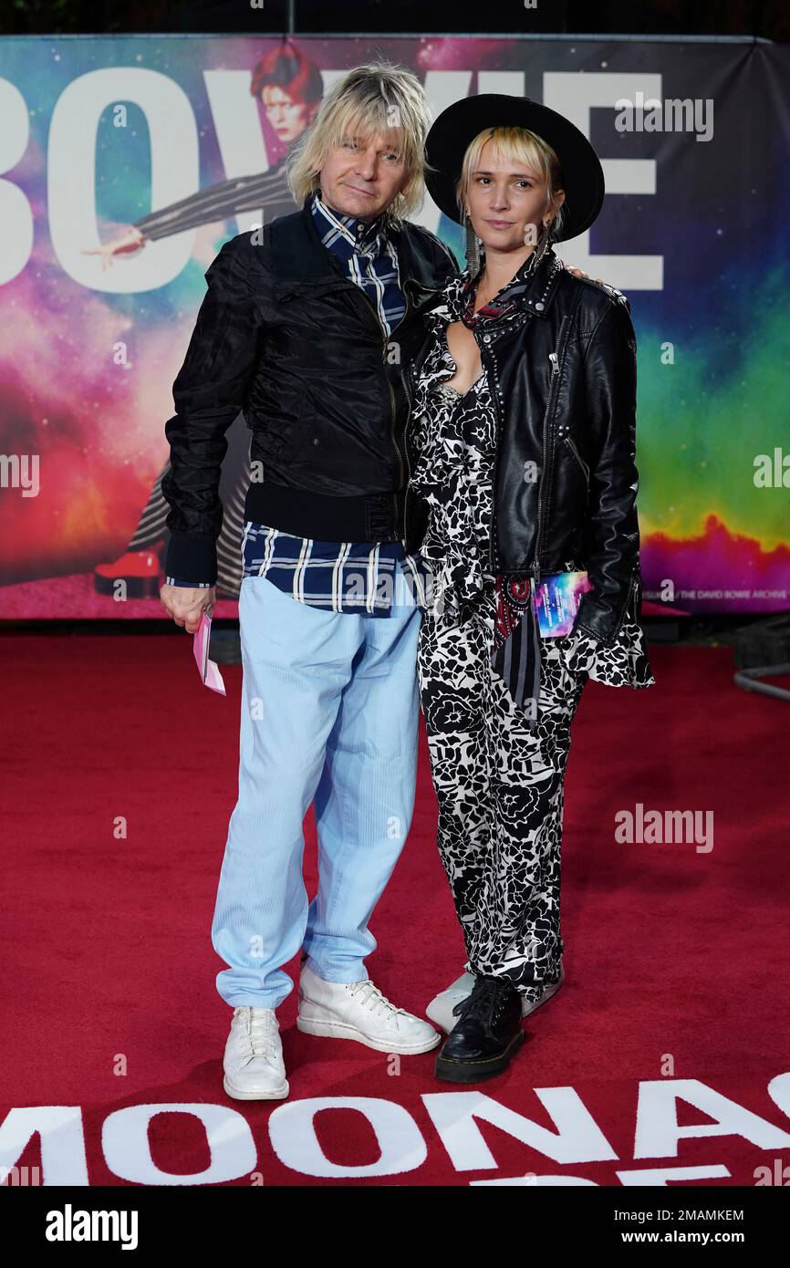 Zak Starkey, from left, and Sshh Liguz pose for photographers upon ...