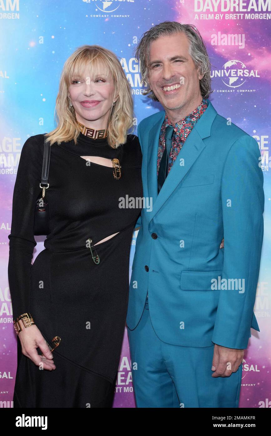 Courtney Love, left, and Director Brett Morgen pose for photographers ...