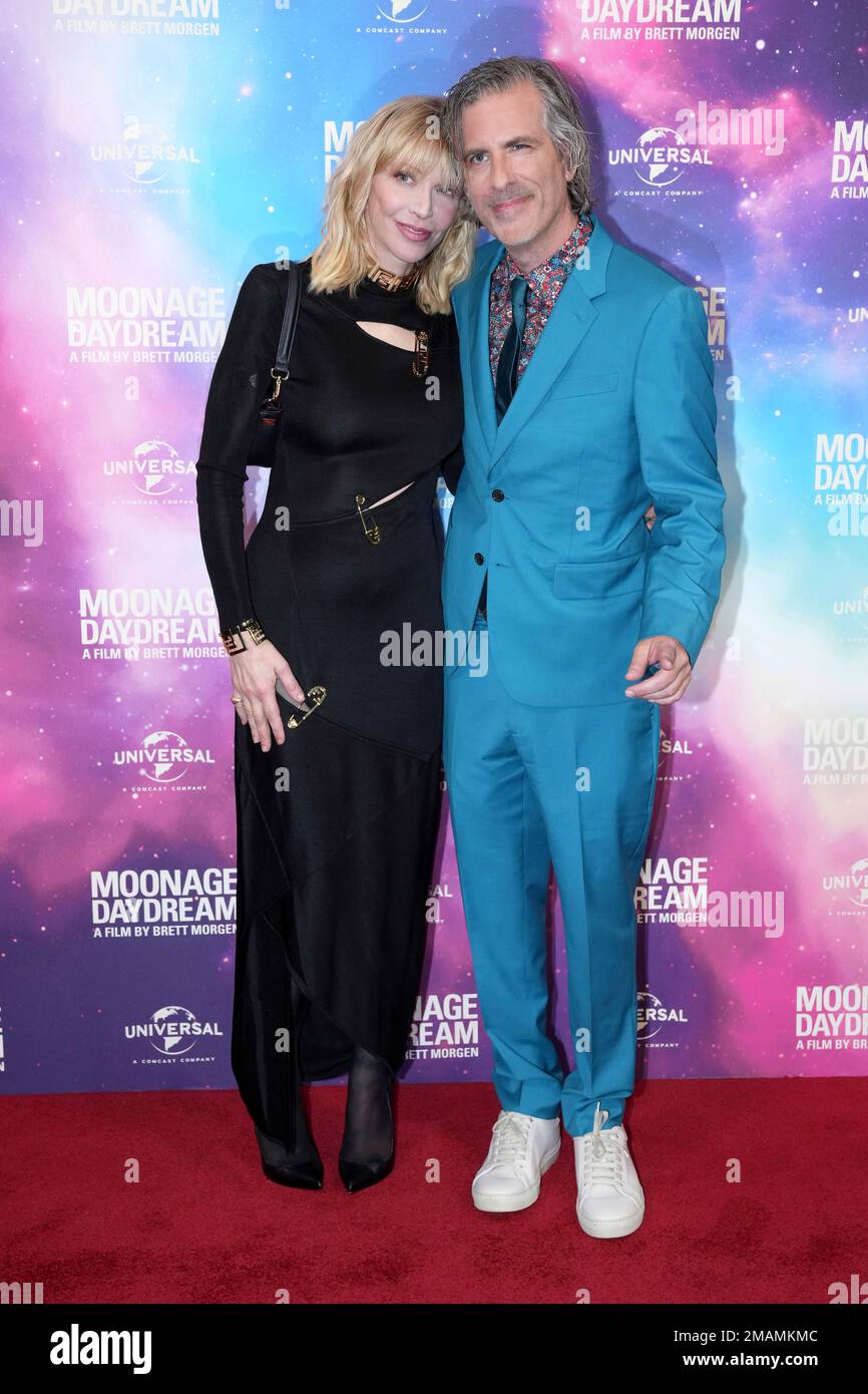 Courtney Love, left, and Director Brett Morgen pose for photographers ...