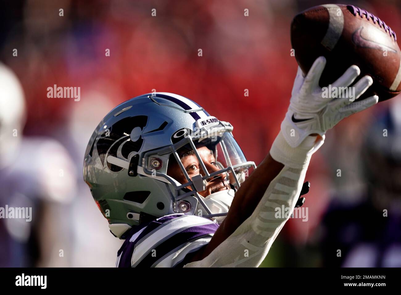 Kansas State running back Deuce Vaughn catches a pass during warmups ...
