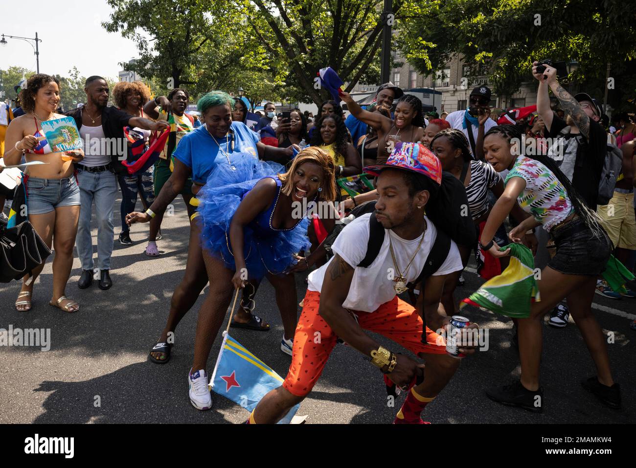 Participants dance during the West Indian Day Parade, Monday, Sep. 5 ...