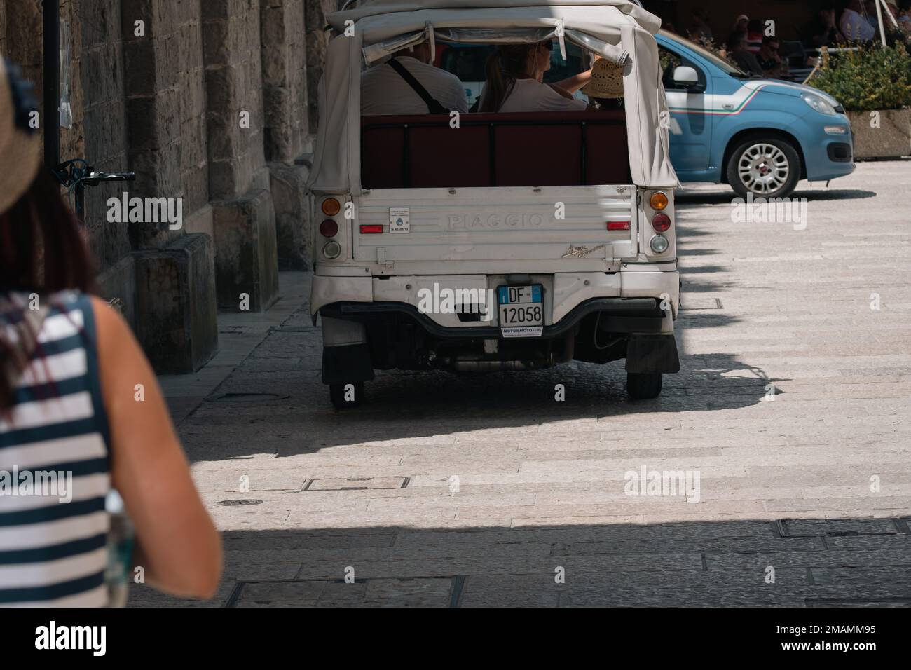 People enjoying daily life and sights in the Italian town of Matera ...