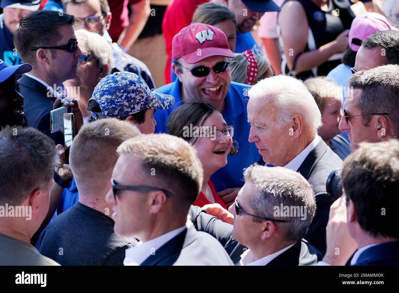 President Joe Biden wades through the crowd after speaking during an ...