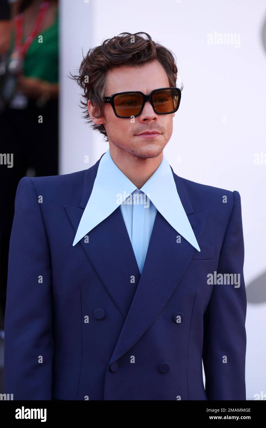 Harry Styles poses for photographers upon arrival at the premiere of ...
