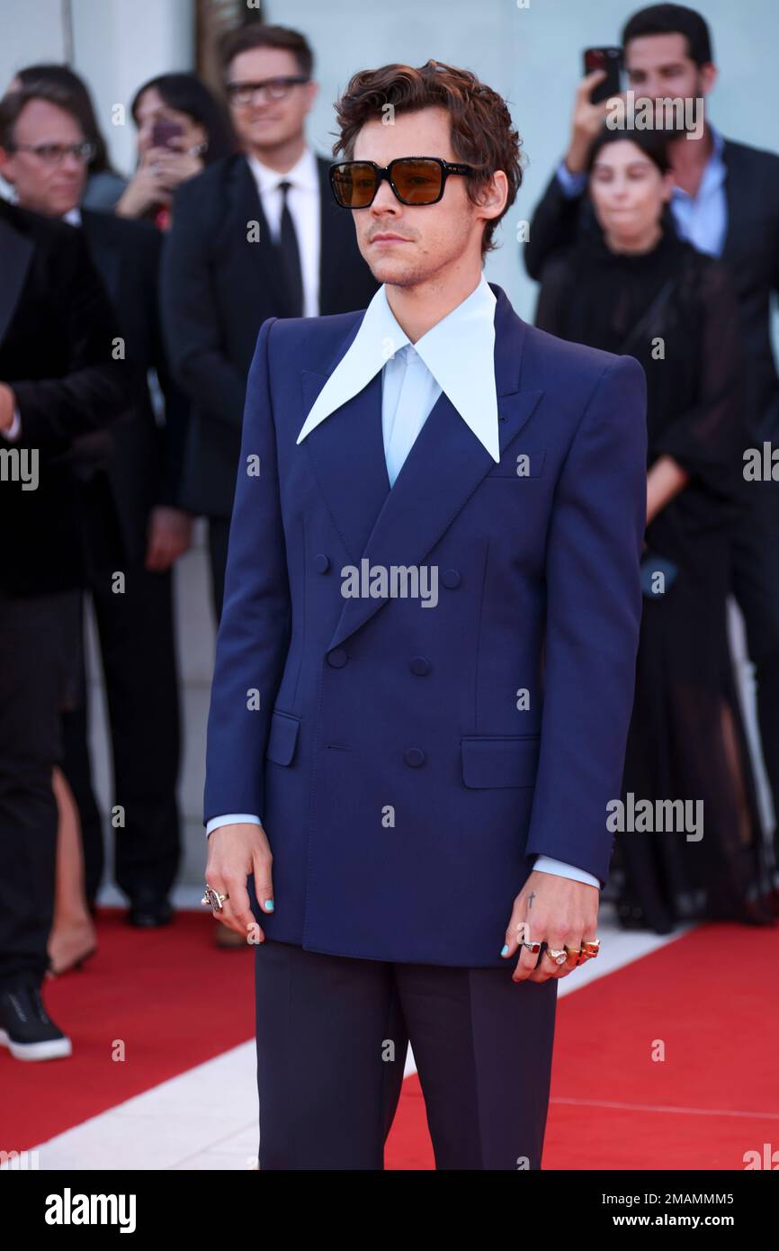 Harry Styles poses for photographers upon arrival at the premiere of ...