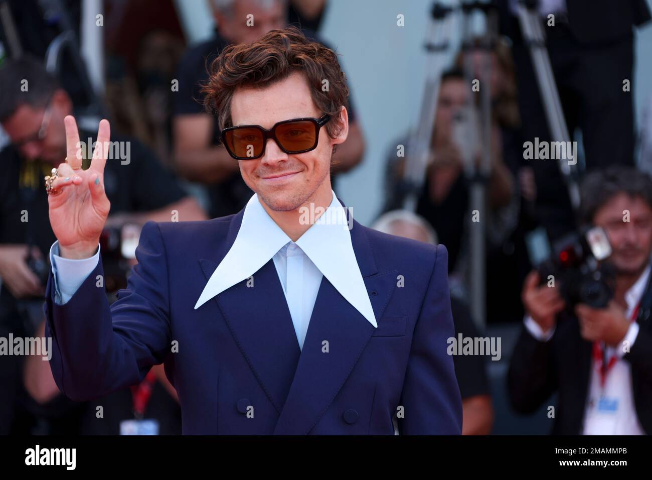 Harry Styles poses for photographers upon arrival at the premiere of ...