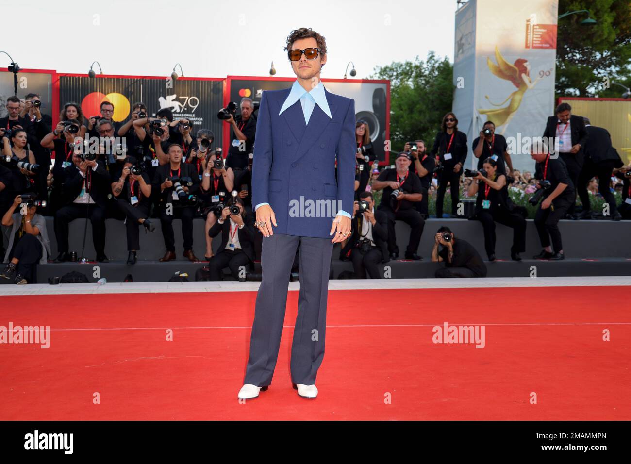 Harry Styles poses for photographers upon arrival at the premiere of ...