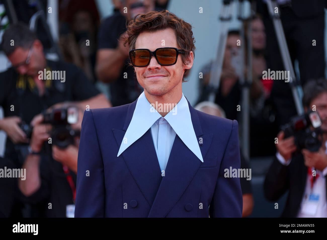 Harry Styles poses for photographers upon arrival at the premiere of ...