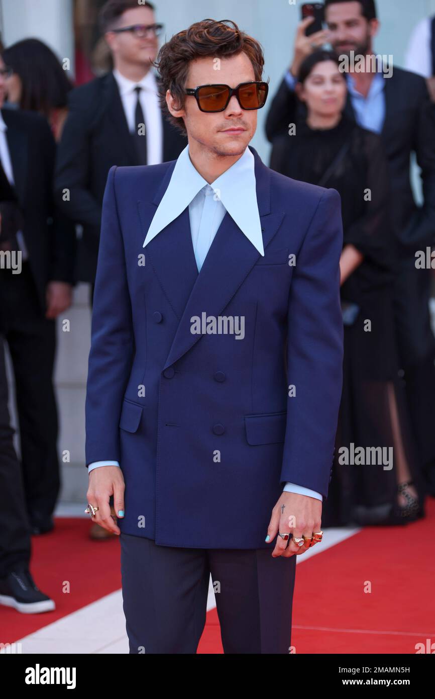 Harry Styles poses for photographers upon arrival at the premiere of ...