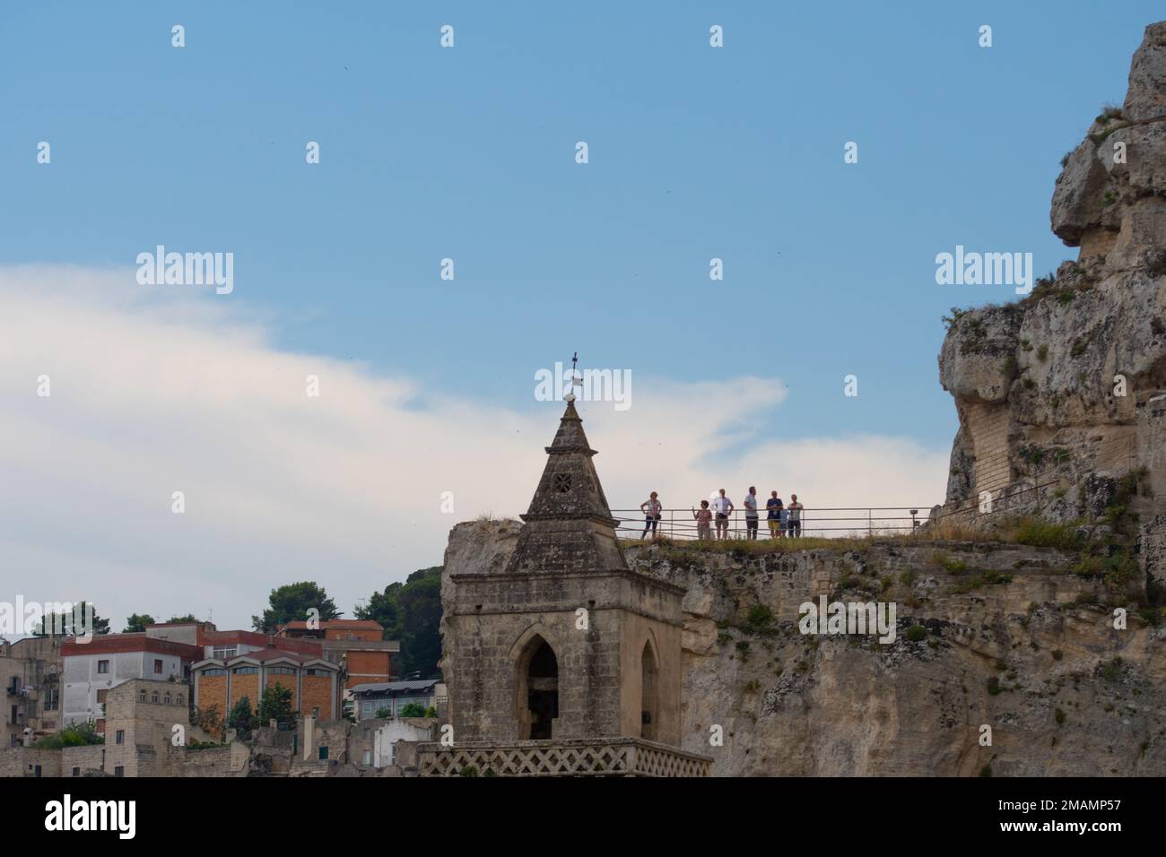 People enjoying daily life and sights in the Italian town of Matera ...