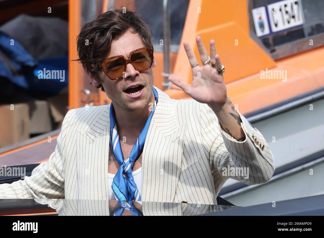 Harry Styles arrives for the photo call of the film 'Don't Worry ...