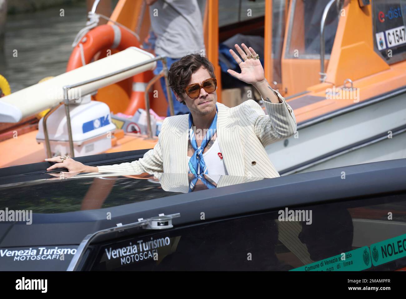 Harry Styles arrives for the photo call of the film 'Don't Worry ...