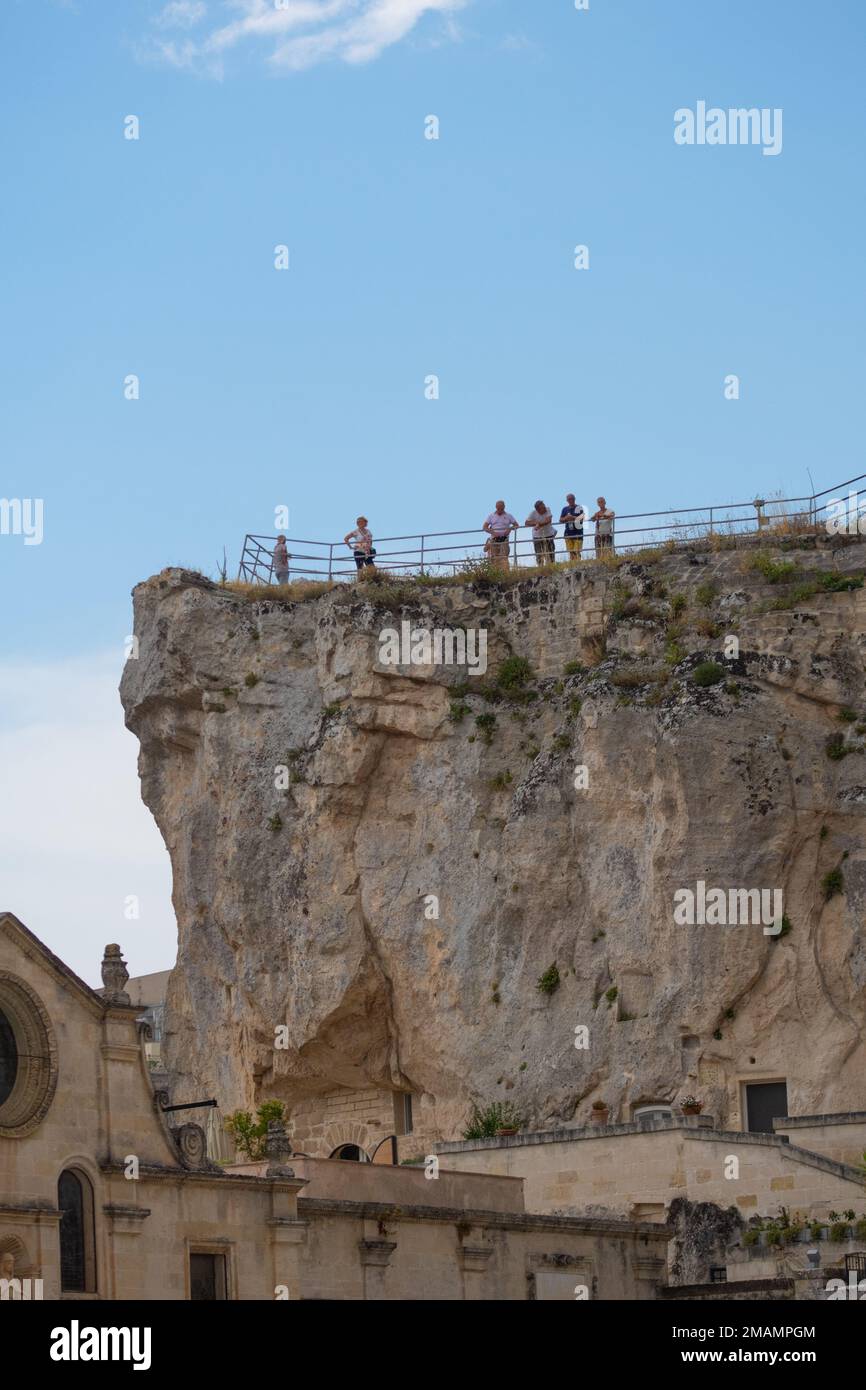 People enjoying daily life and sights in the Italian town of Matera ...
