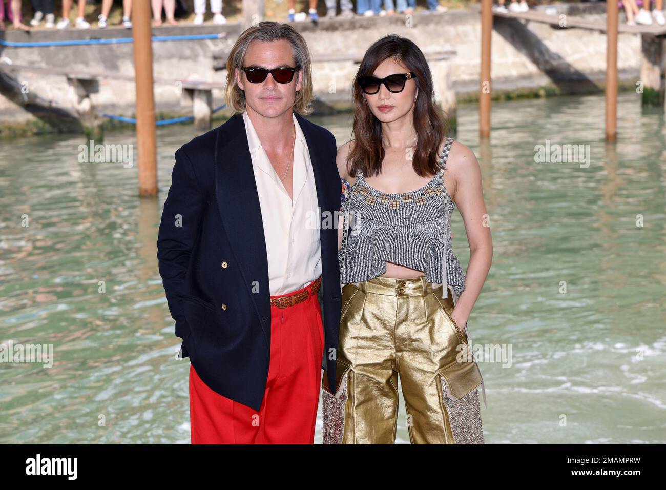 Chris Pine, left, and Gemma Chan pose for photographers upon arrival ...