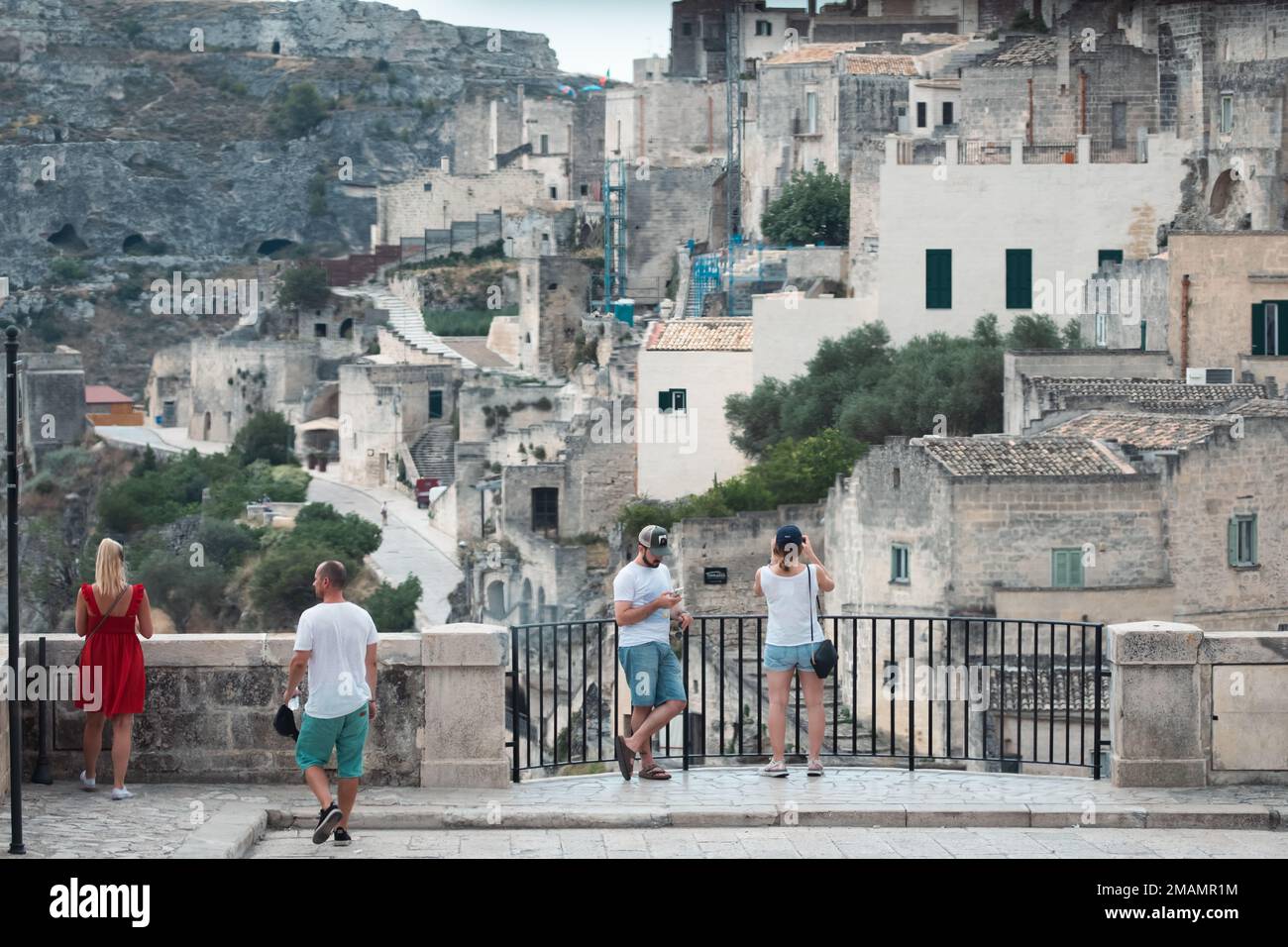 People enjoying daily life and sights in the Italian town of Matera ...