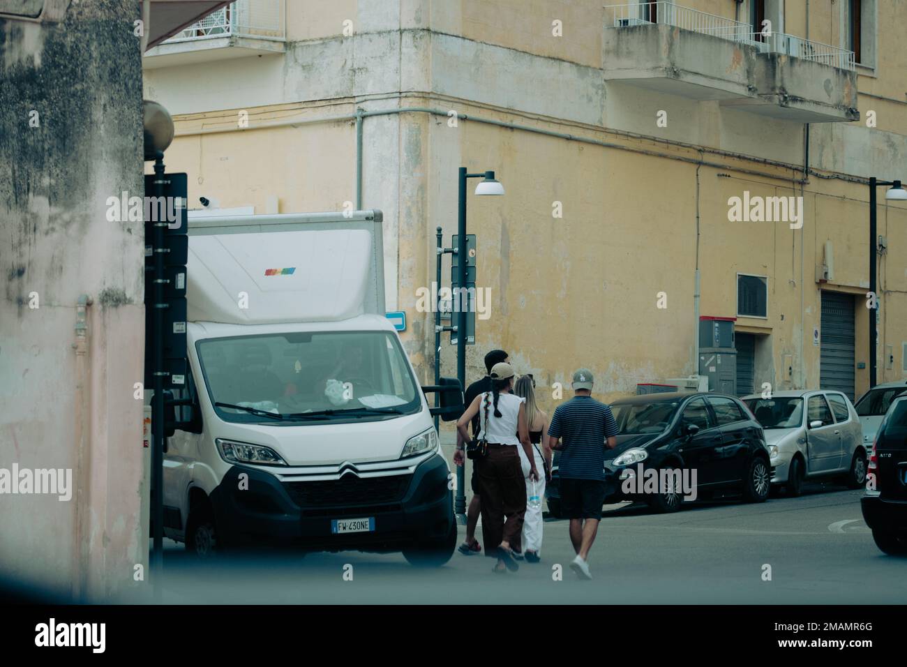 People enjoying daily life and sights in the Italian town of Matera ...