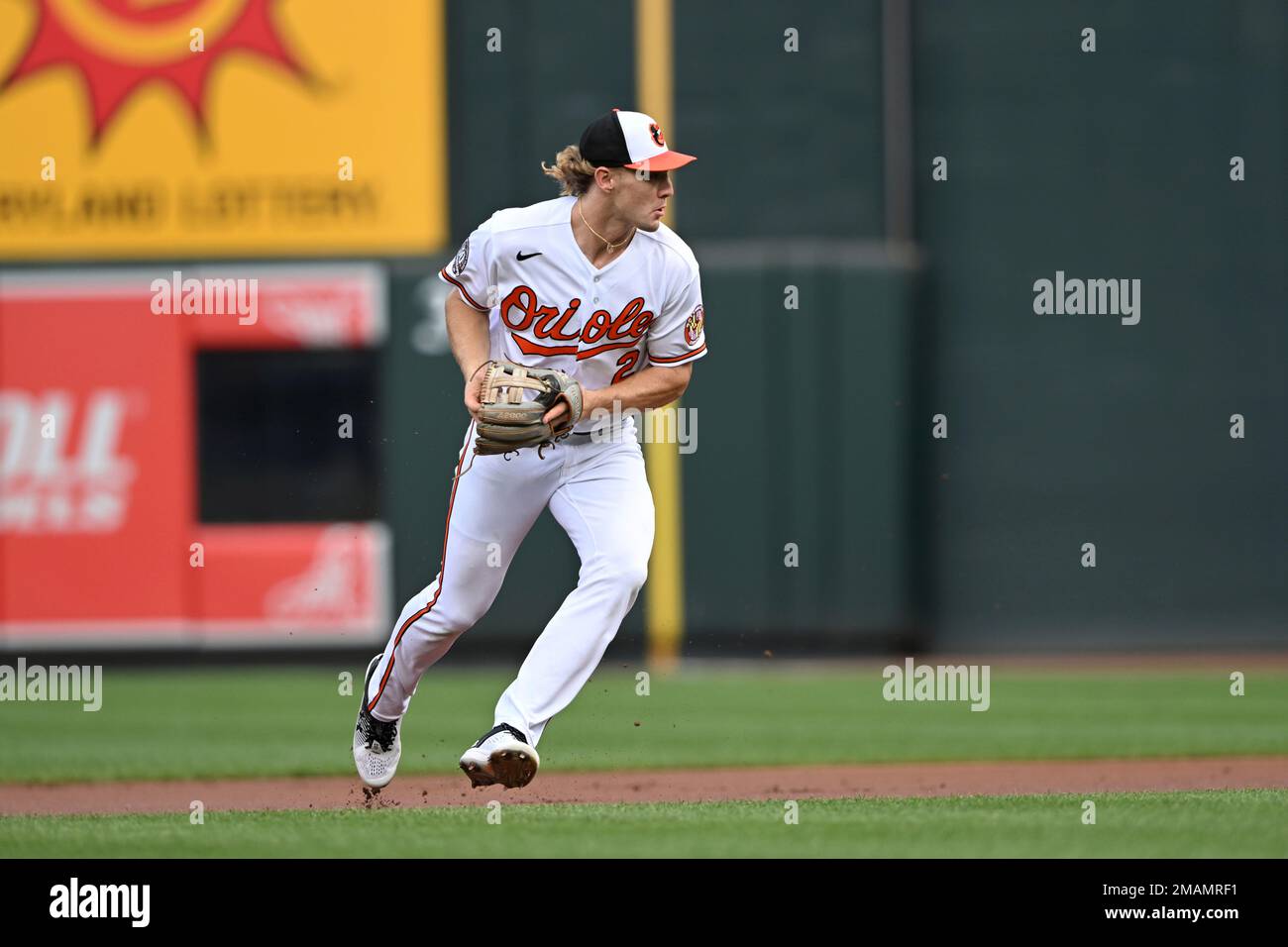 Baltimore Orioles second baseman Gunner Henderson throws to first in a ...