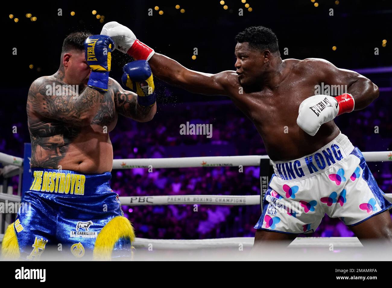 Andy Ruiz, Jr., left, fights Luis Ortiz in a WBC world heavyweight ...