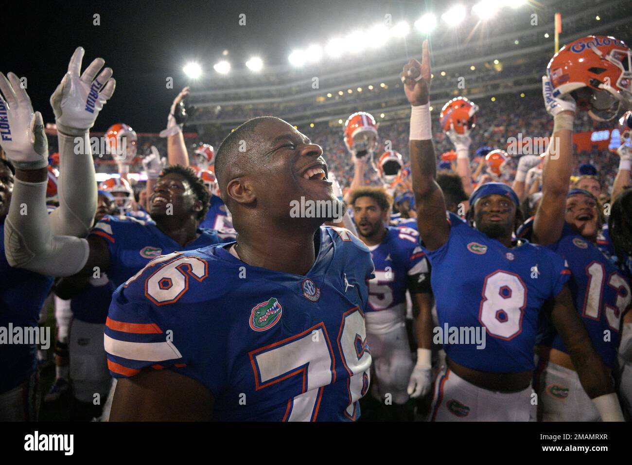 Florida offensive lineman Richard Gouraige (76) celebrates with ...