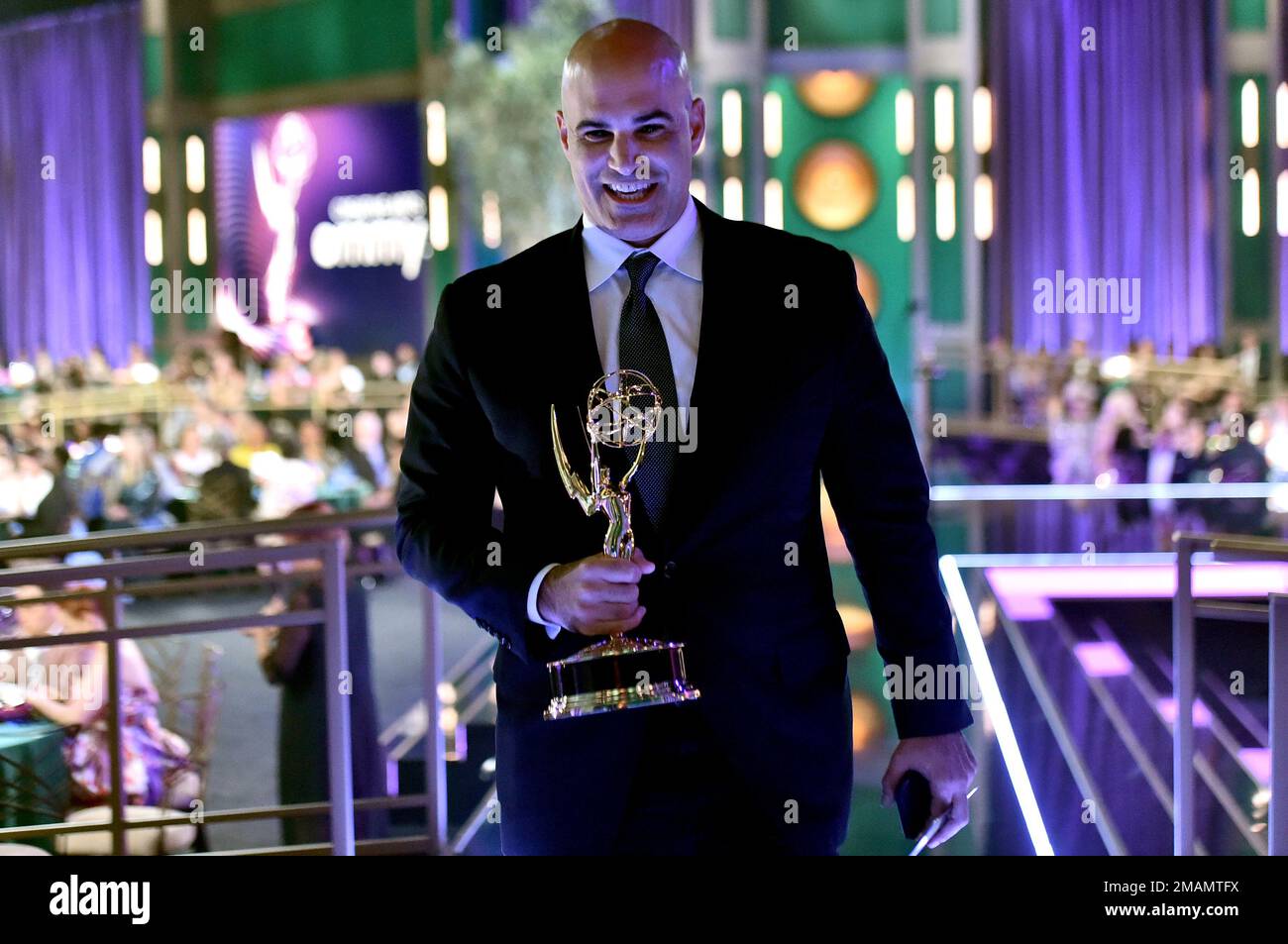 EXCLUSIVE - John M. Valerio walking backstage after winning the Emmy for outstanding single ...