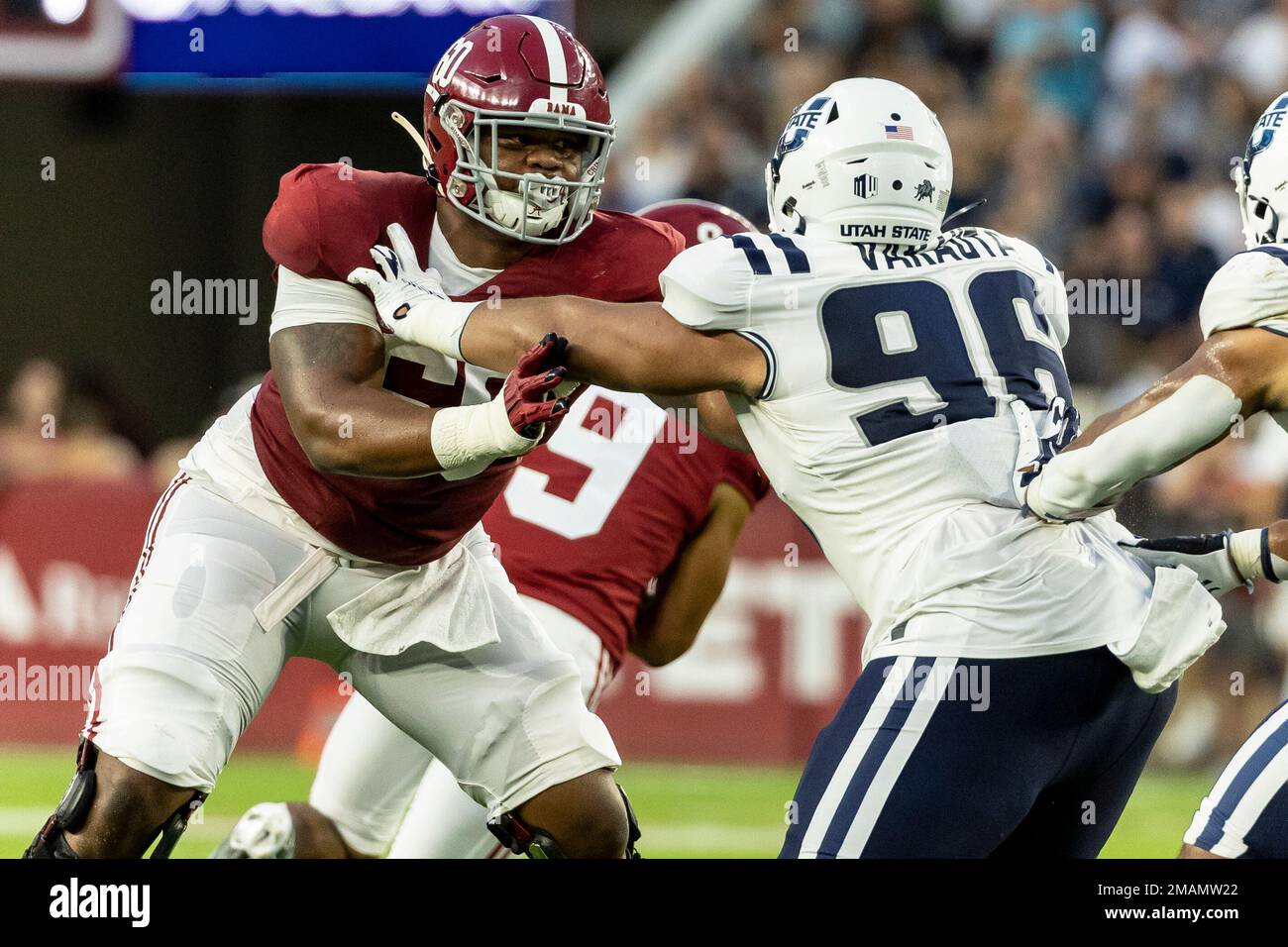 Alabama offensive lineman Kendall Randolph (60) blocks Utah State ...