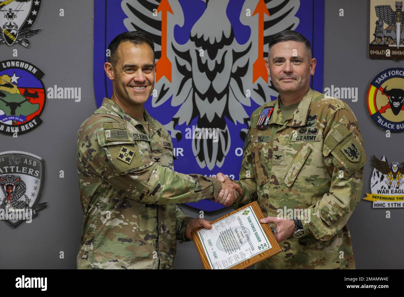 U.S. Army Col. Andrew Steadman, left, 1st Stryker Brigade Combat Team ...