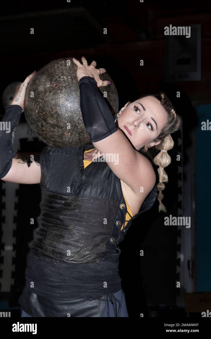 woman from the basque country practicing the rural sport of stone ...