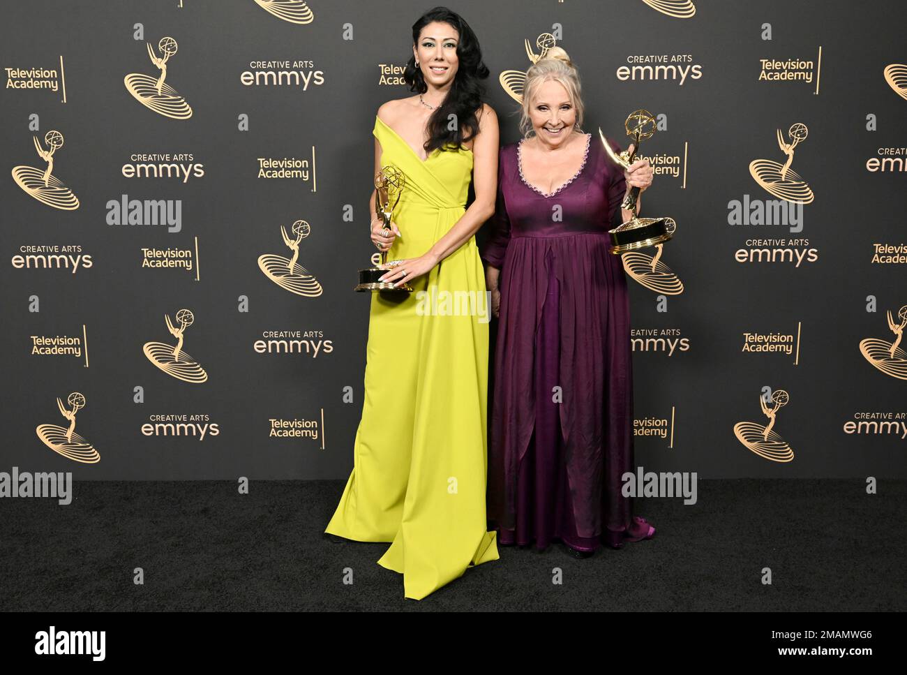 Laura Montgomery, left, and Judy Laukkanen pose with the Emmy for ...