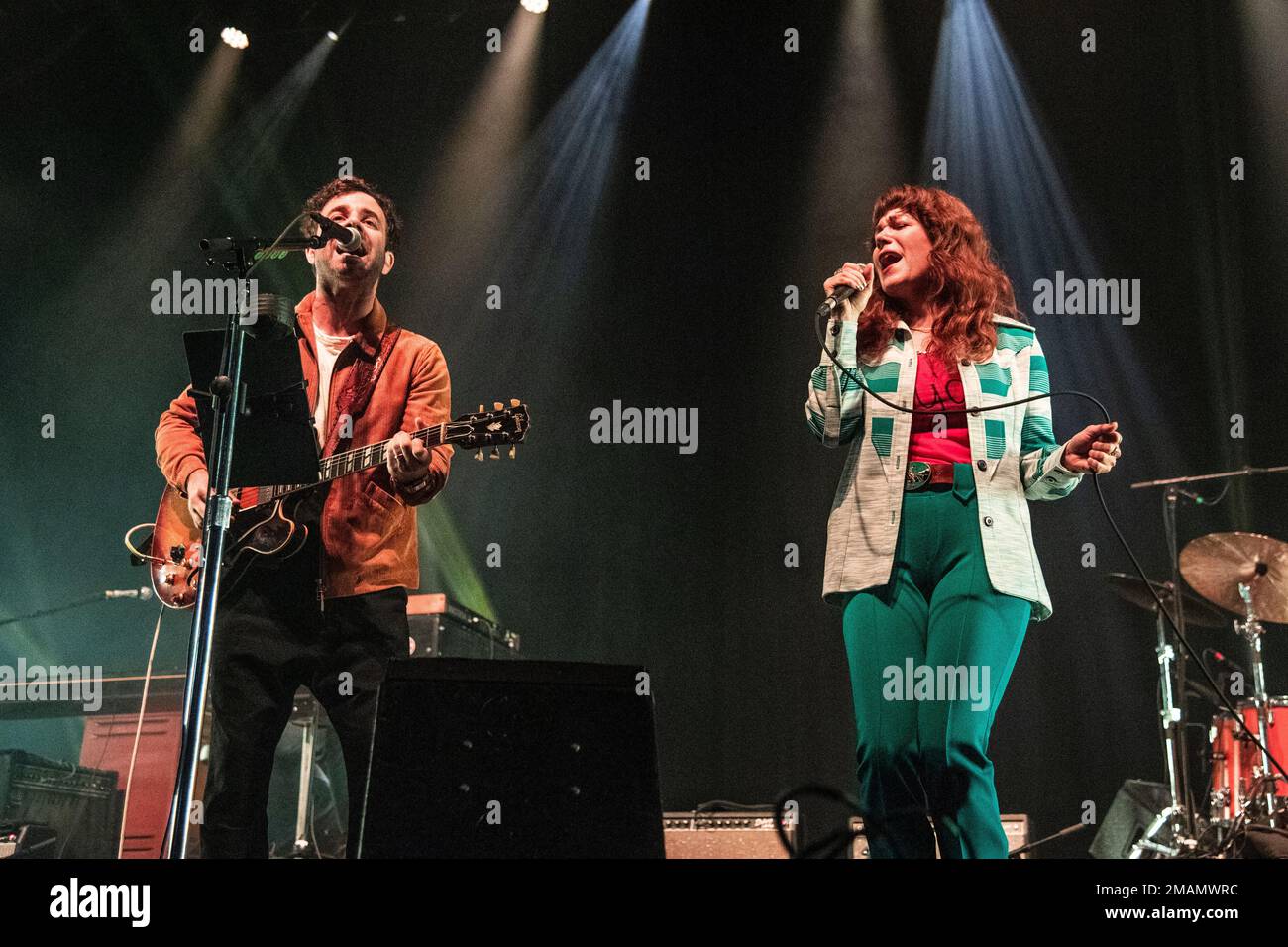 Taylor Goldsmith, left, of Dawes and Jenny Lewis perform during the Tom ...