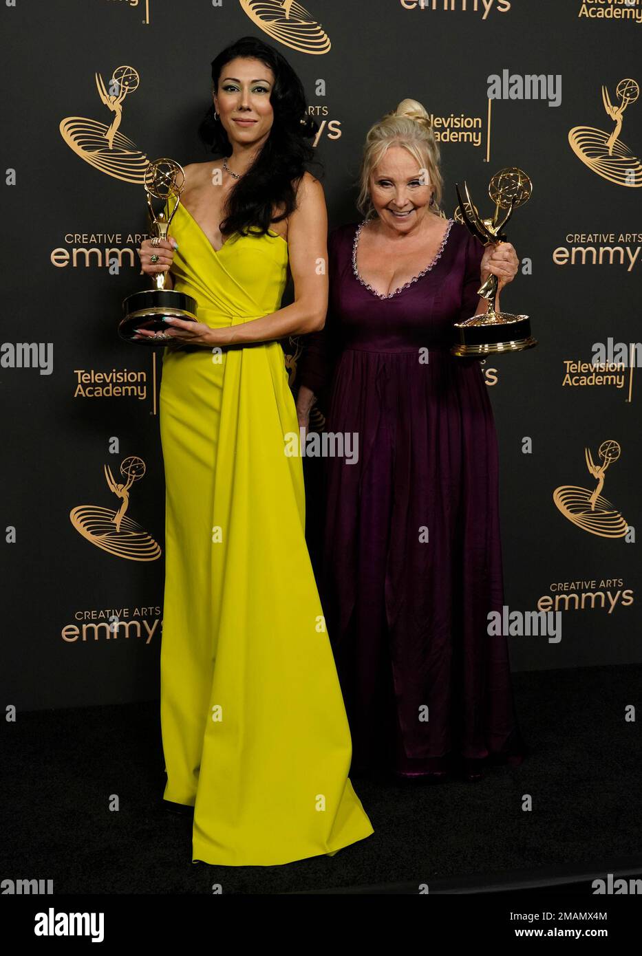 Laura Montgomery, left, and Judy Laukkanen pose in the press room with ...