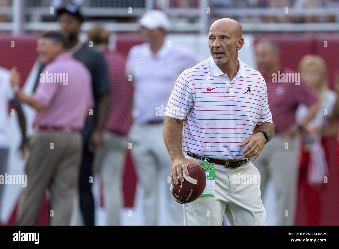 Alabama safeties coach Charles Kelly warms up his players before an ...