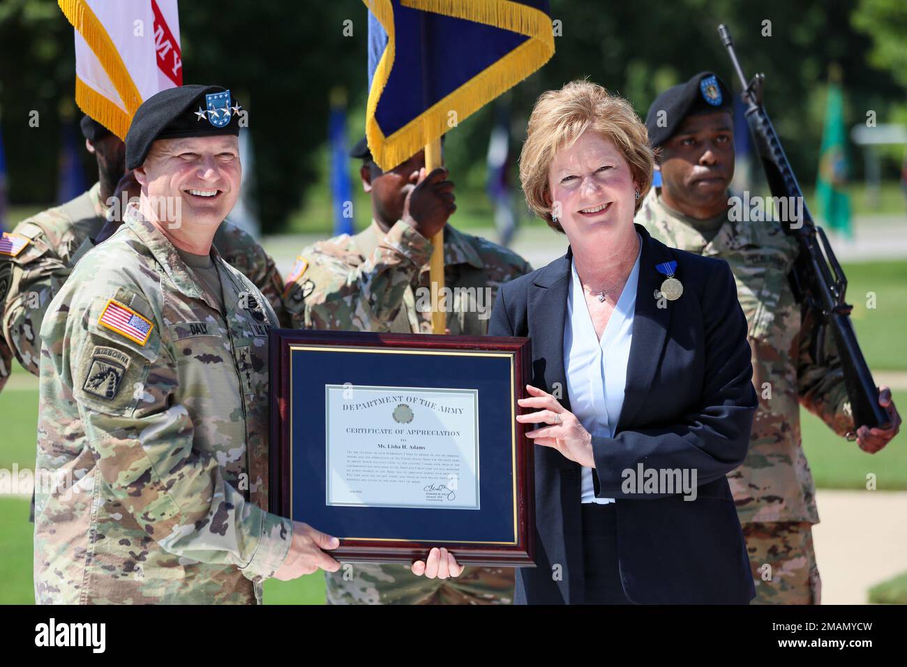 Army Materiel Command's Lisha Adams receives a Certificate of ...