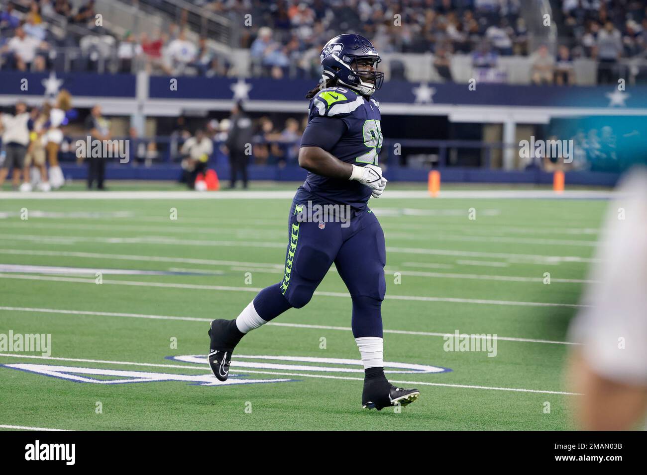 Seattle Seahawks defensive tackle Myles Adams (95) jogs off th field ...