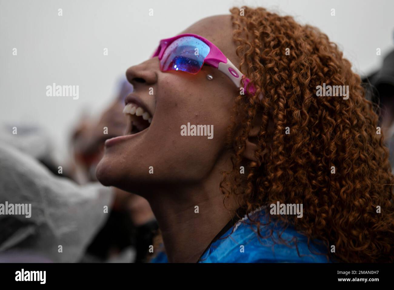 A music fan cheers during the performance of the Brazilian rapper Matue ...