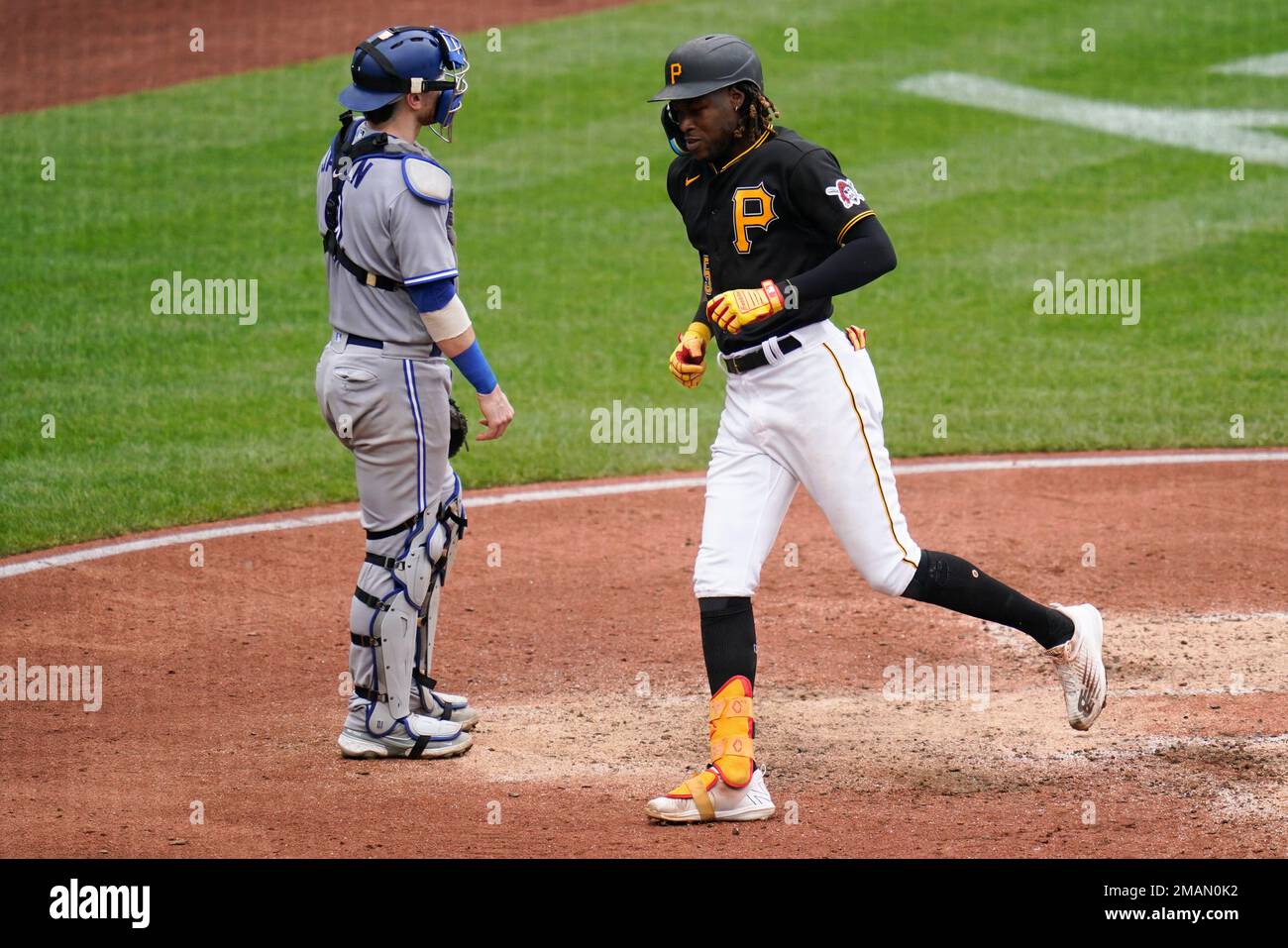 Pittsburgh Pirates' Oneil Cruz, right, trots past Toronto Blue Jays ...