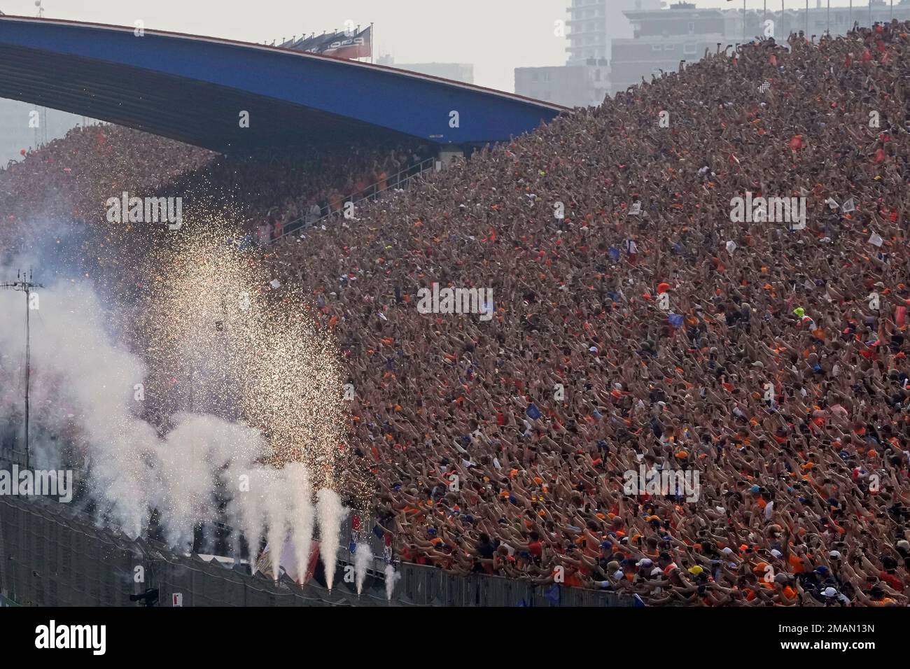 Fireworks go off along the stands packed with cheering fans as Red Bull ...