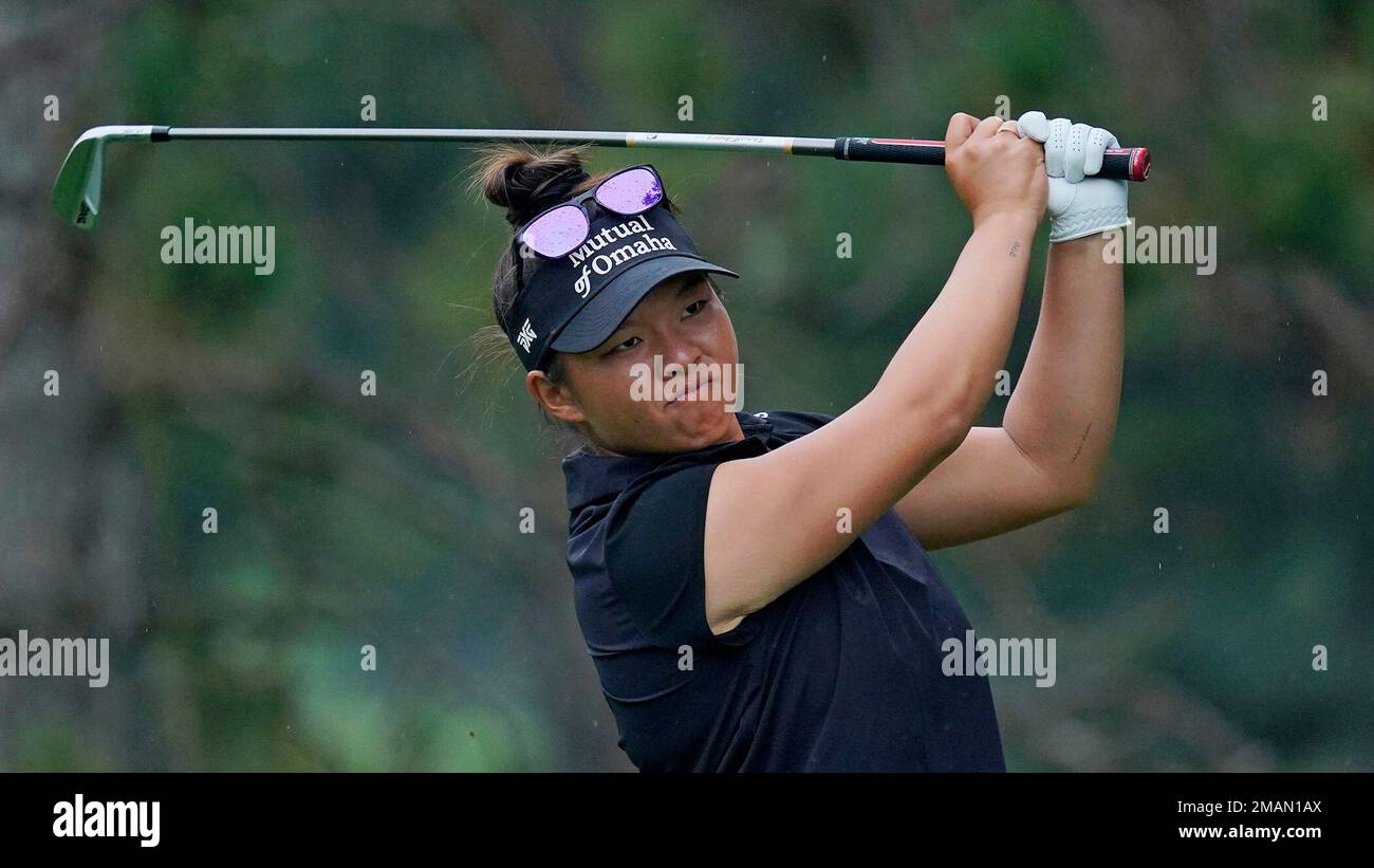Megan Khang follows through on her tee-shot on the second hole during ...