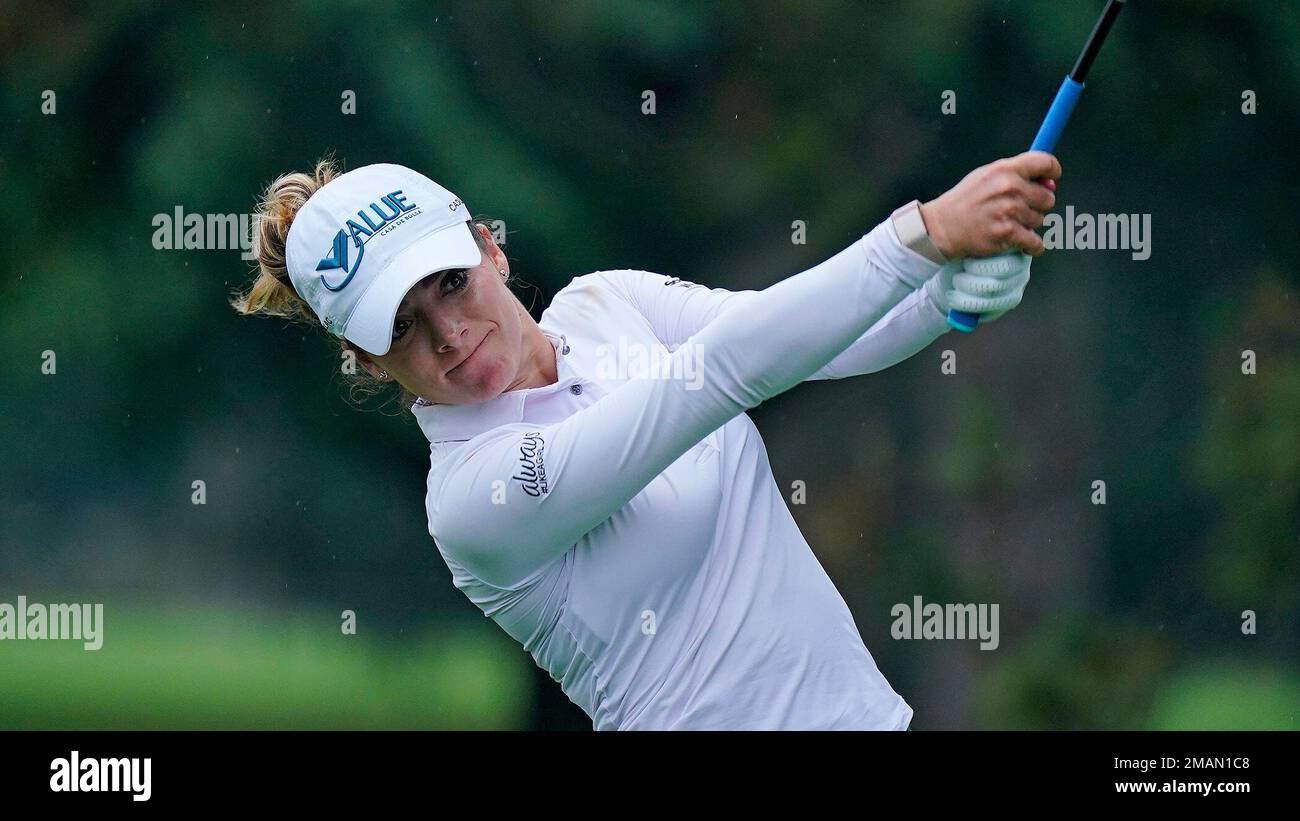 Gaby Lopez of Mexico follows through on her tee-shot on the second hole ...