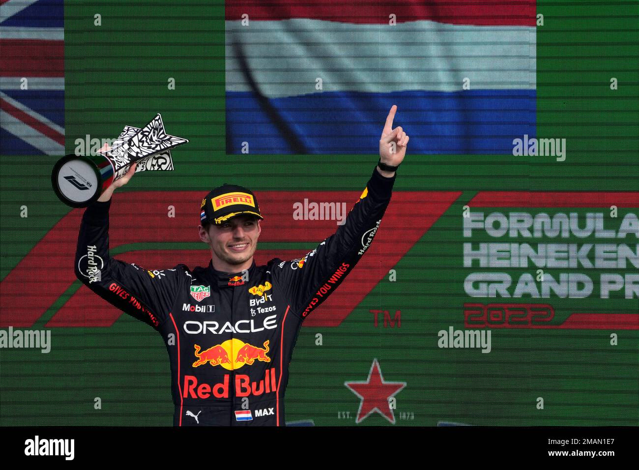 Red Bull driver Max Verstappen of the Netherlands lifts his trophy on ...