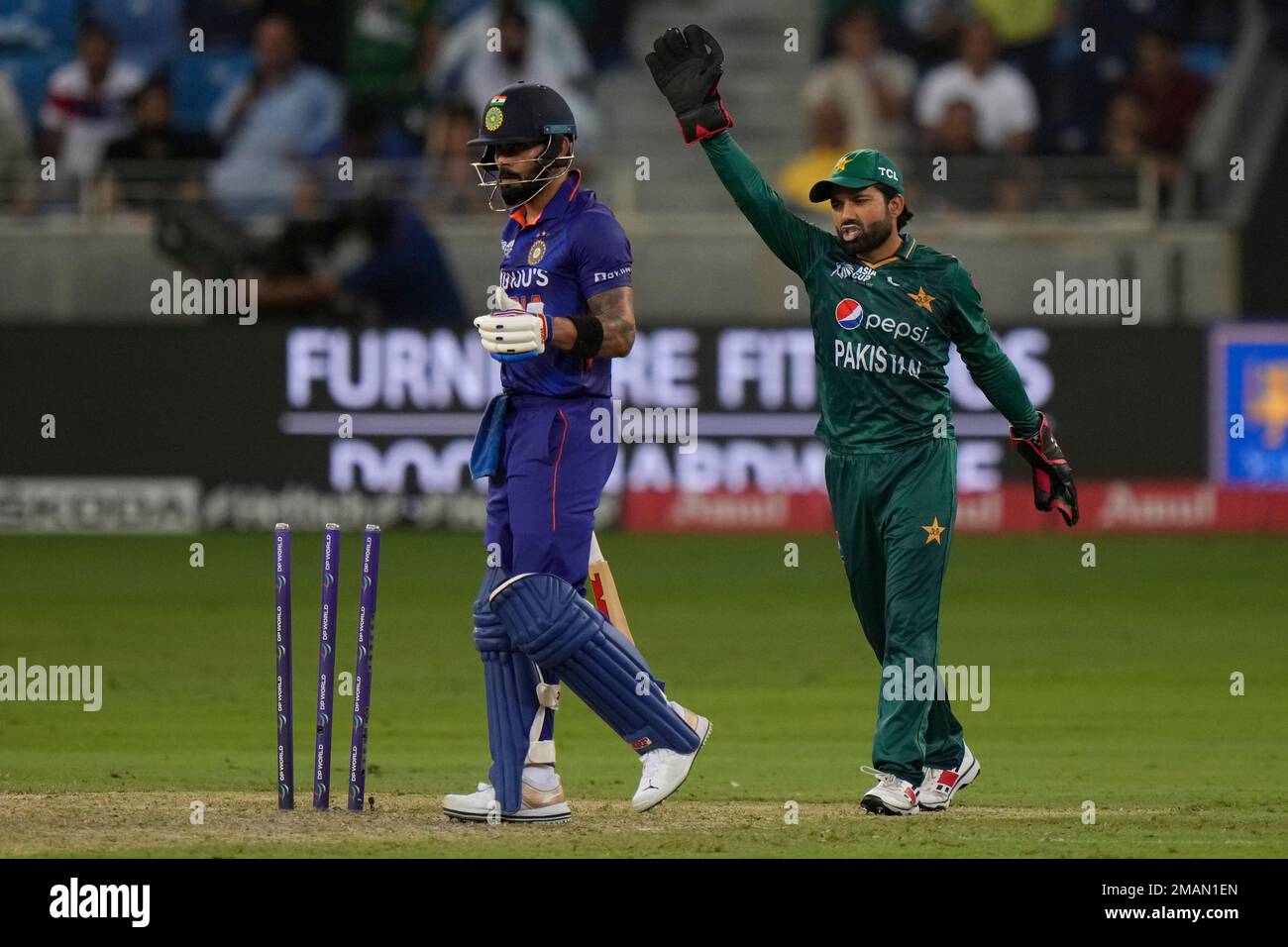 Pakistan's wicketkeeper Mohammad Rizwan, right, celebrates the ...